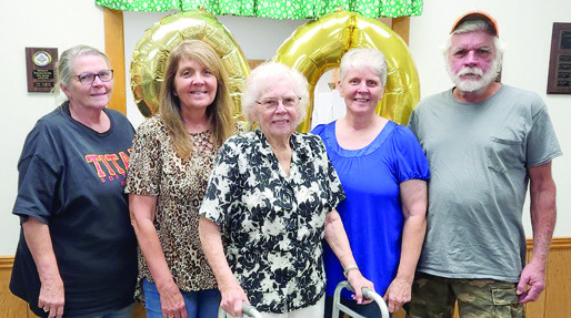 Wanda Tillman (center) was honored by her children Brenda Qualls ...